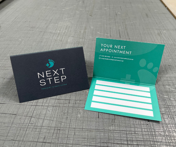 Folded appointment / business cards and flyers for Next Step Podiatry ...