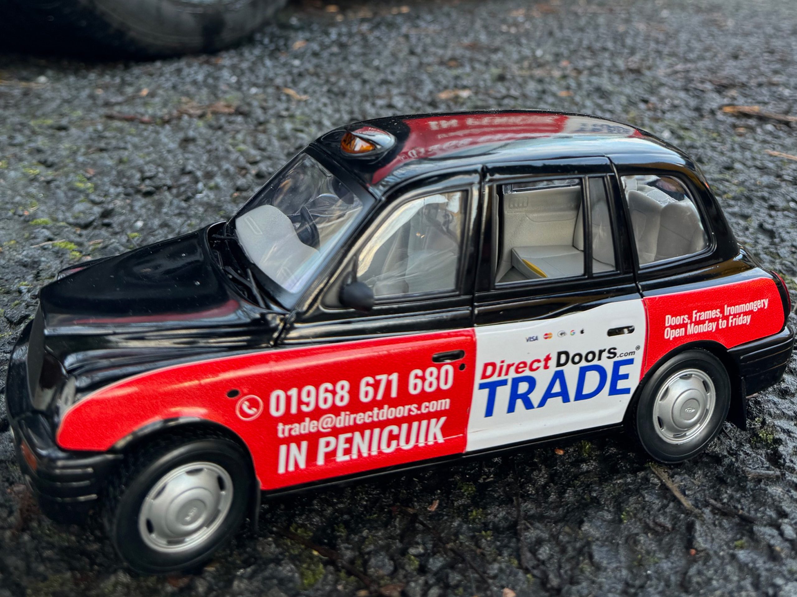 Partial Vinyl Wrap On Taxi - First Display - Signs & Graphics 2025